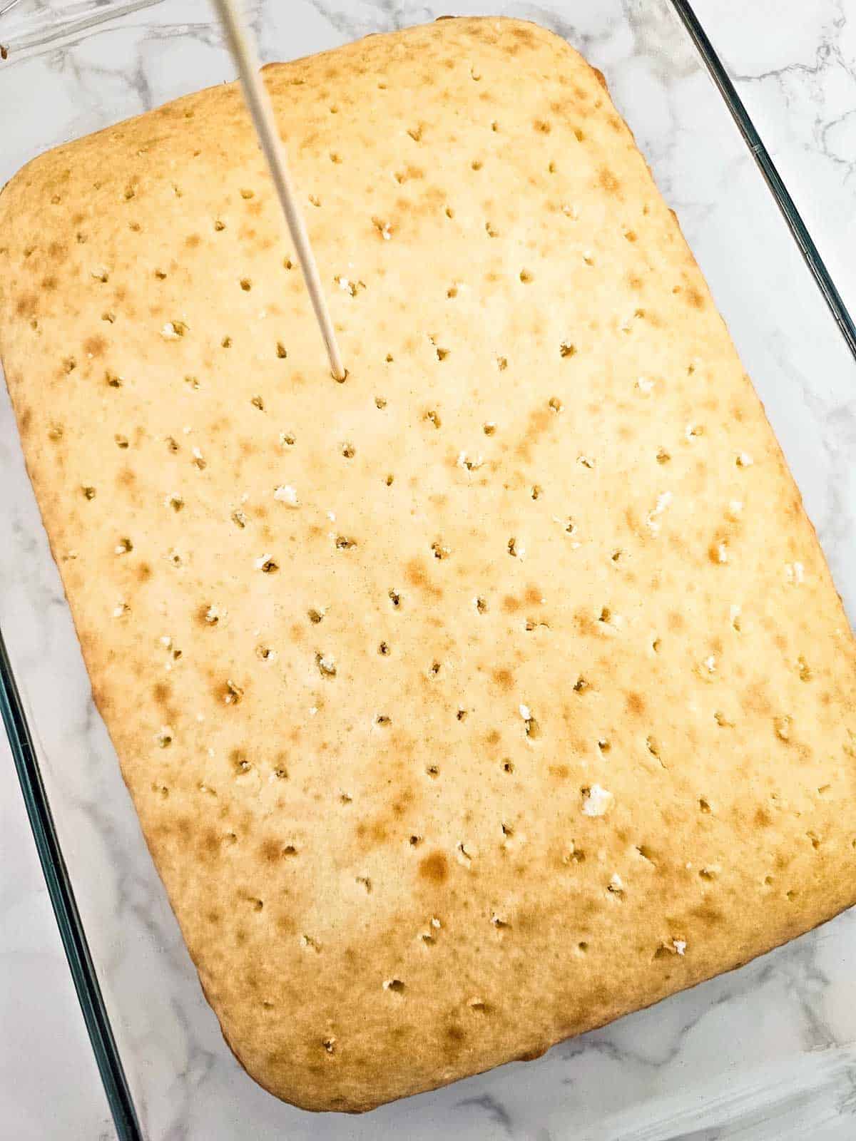 Cherry Jello Poke Cake Recipe With Dream Whip frosting · Artsy Fartsy Life