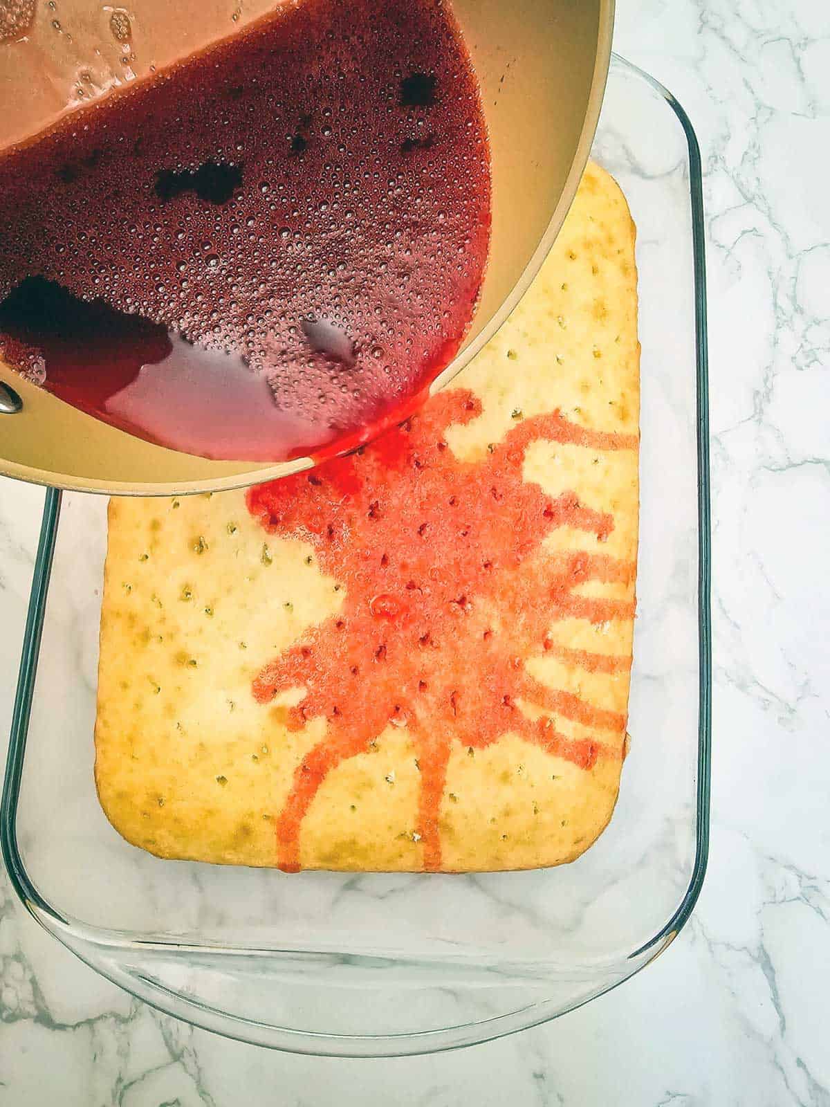 Cherry Jello Poke Cake Recipe With Dream Whip frosting · Artsy Fartsy Life